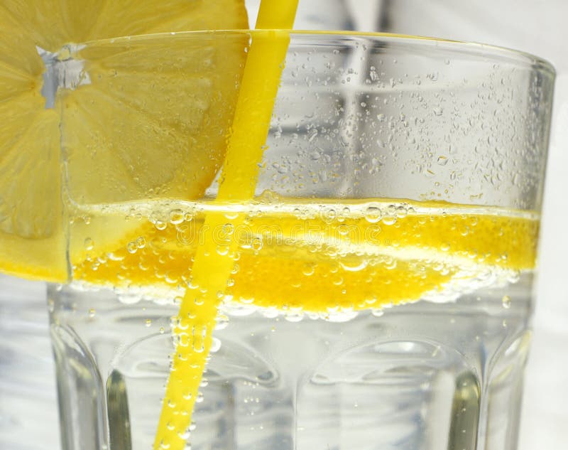 Lemon in the Glass of Water Stock Image - Image of dish, indoors: 238104239