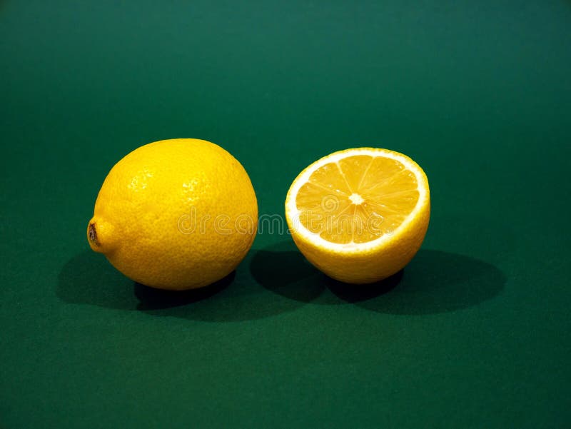 Lemon in Hand on Green Background Isolation Stock Image - Image of ...