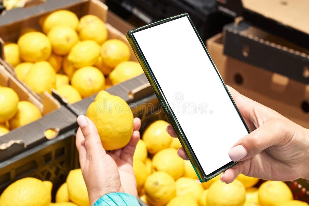 Lemon in Hand and Smartphone Isolated White Stock Image - Image of ...