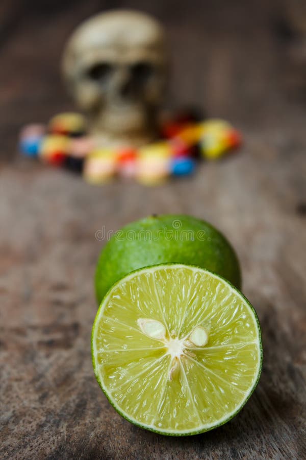 Lemon and Human Skull in the Pile of Drugs. Stock Photo - Image of ...