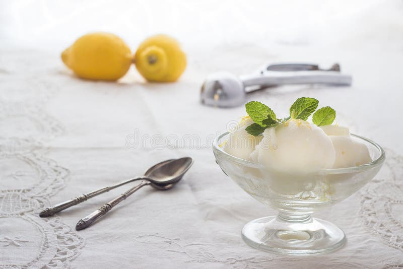 Lemon Ice Cream with Spoons and Lemons Stock Image - Image of dessert ...