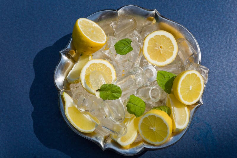 Lemon on ice stock image. Image of beverage, garden, summer - 41248055