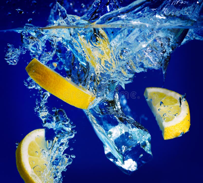 Lemon and ice spalsh stock image. Image of food, dropped - 18083391