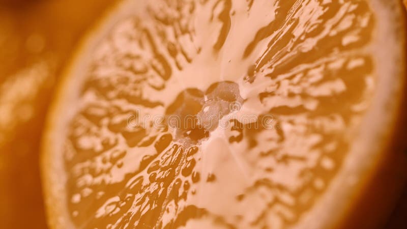 Lemon Juice Splashes Super Slow Motion on Black Background. Stock ...