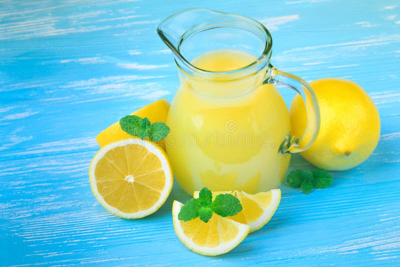 A pitcher of lemon juice stock vector. Illustration of punch - 33693379