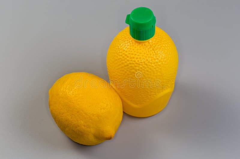 Lemon Juice Plastic Container Fresh Gray Background Stock Photos - Free ...