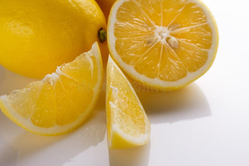 Lemon and Juice on a White Background Stock Photo - Image of squeezed ...