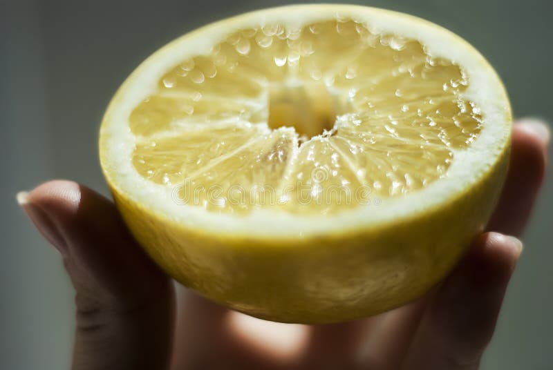 Lemon stock photo. Image of fingers, citrus, slice, blur - 54974106
