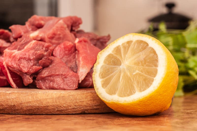 Lemon in the Kitchen and Raw Meat for Stew Stock Photo - Image of ...