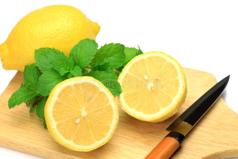 Lemon and knife stock photo. Image of cutting, board - 22395524