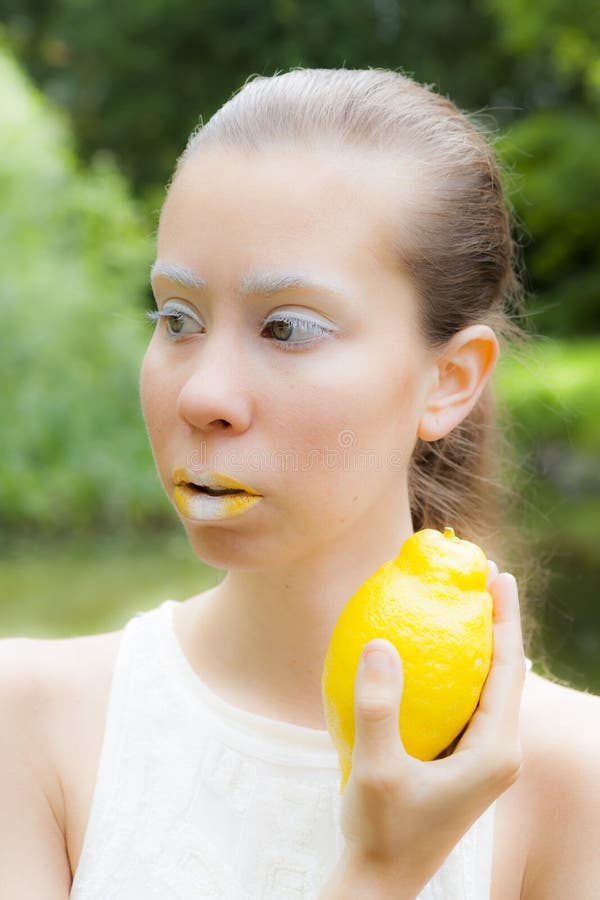 Lemon Lady stock image. Image of lemon, dress, posing - 51675303