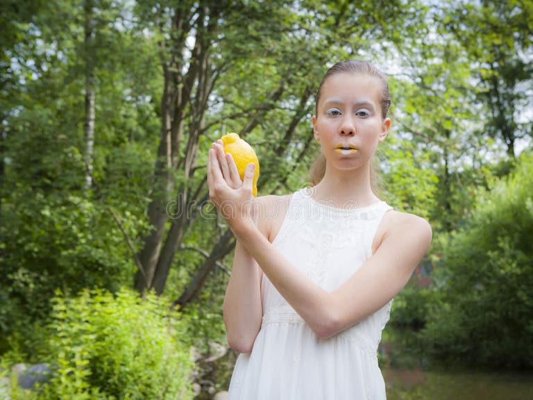 Lemon Lady stock image. Image of brunette, girl, summer - 51675585