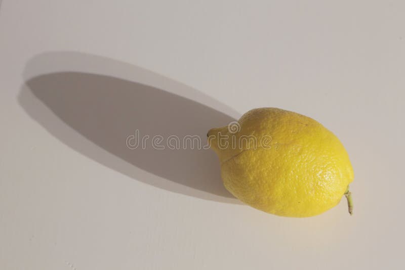 Lemon with shadow 003 stock photo. Image of lemon, presentation - 140035788