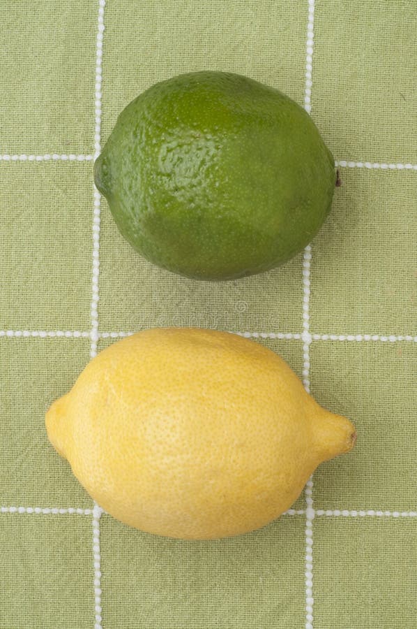 Lemon and Lime on Green Kitchen Towel Stock Image - Image of concept ...