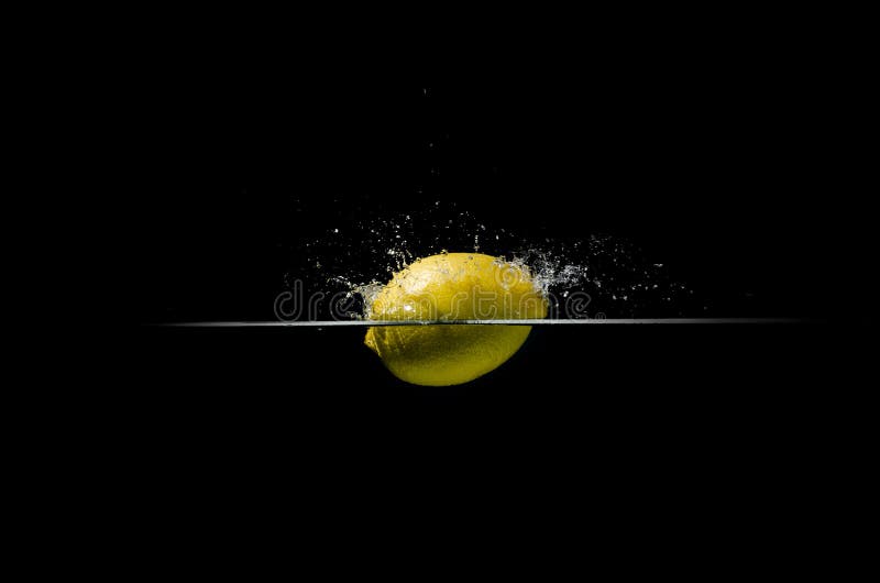 Lemon Making Splashes in the Water Stock Photo - Image of splashes ...