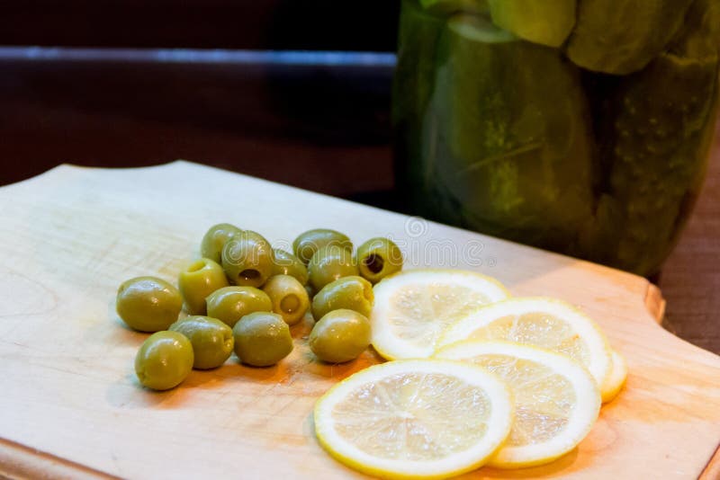 Lemon and olives stock image. Image of clove, lemon, berry - 65790043