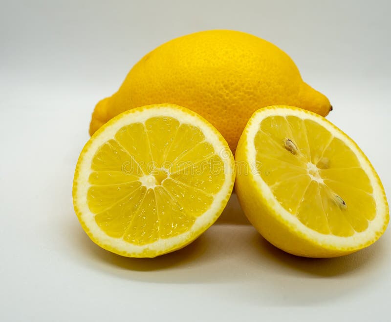 A Lemon with One Slice Missing from it and the Other Half Cut Out Stock ...