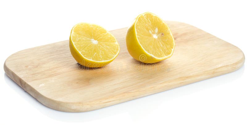 Lemon over chopping board stock photo. Image of counter - 38104608