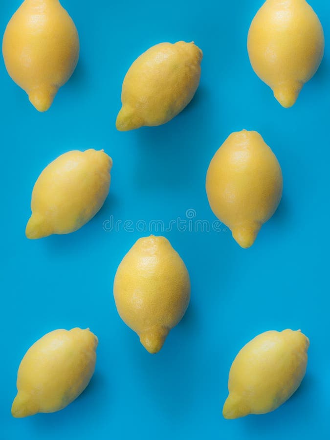 Lemon pattern on blue stock photo. Image of background - 156143402