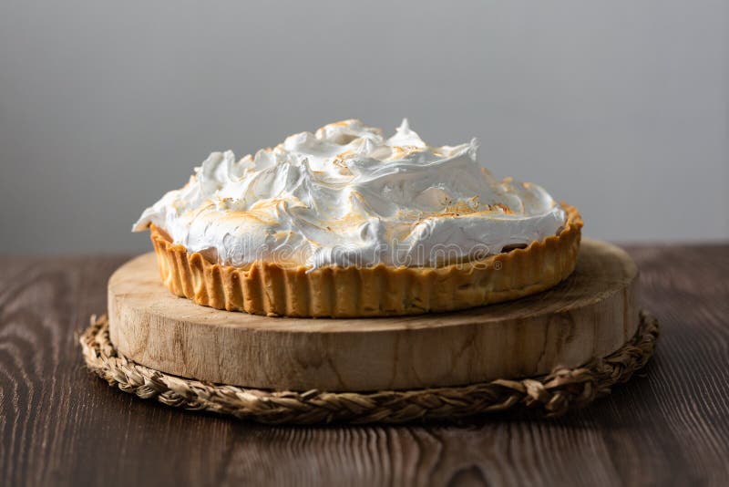 Lemon Pie on Top of Log and Wooden Table. Front View Stock Image ...