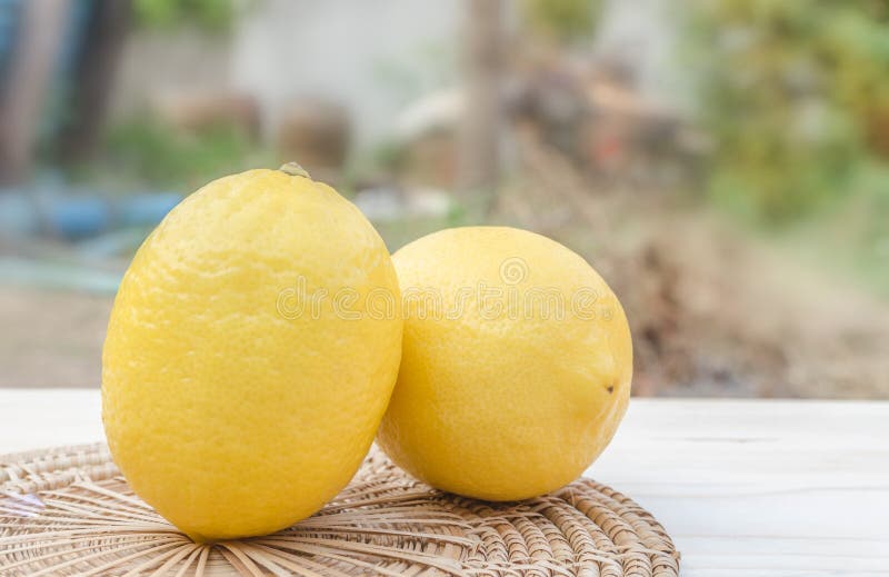 Lemon Placed on Wooden Table Stock Photo - Image of yellow, food: 67103228