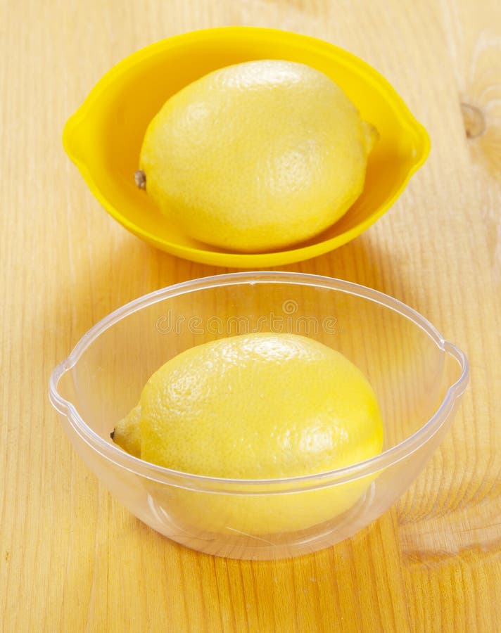 Lemon and Plastic Lemon Box Stock Image - Image of vegetarian, fruit ...