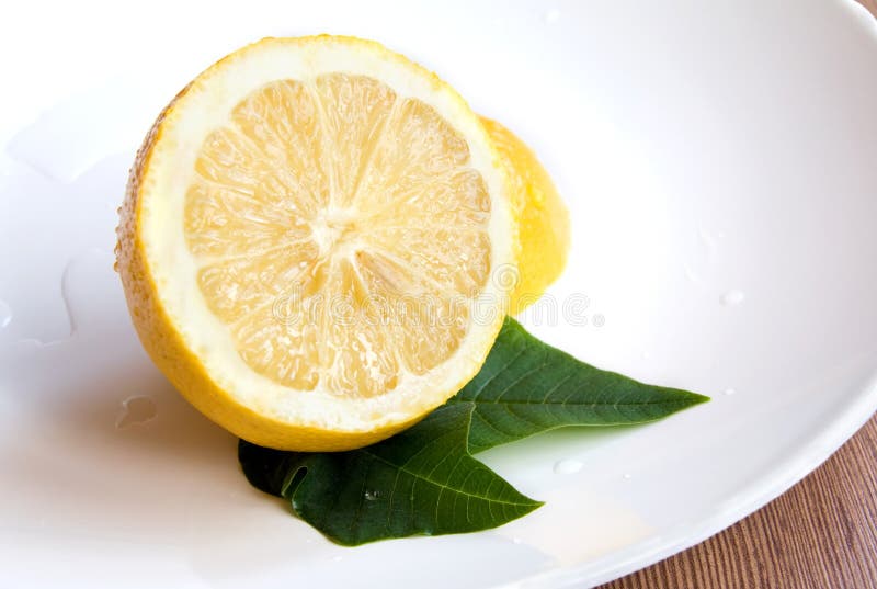 Lemon on the Plate stock image. Image of ripe, organic - 9040591