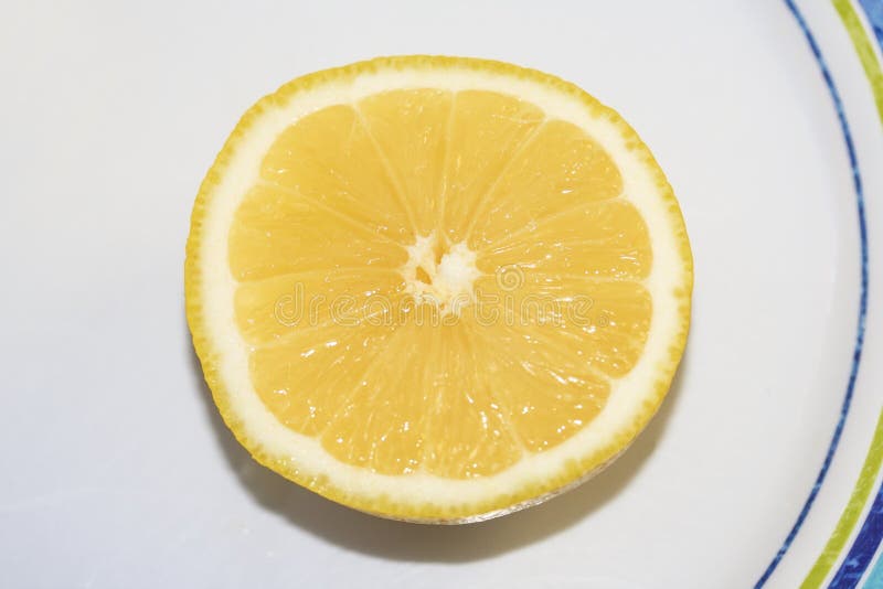 Lemon on plate stock photo. Image of closeup, citrus - 61915764