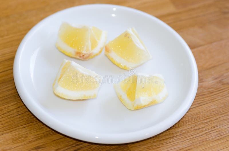 Lemon on plate stock image. Image of circle, healthy - 30731389