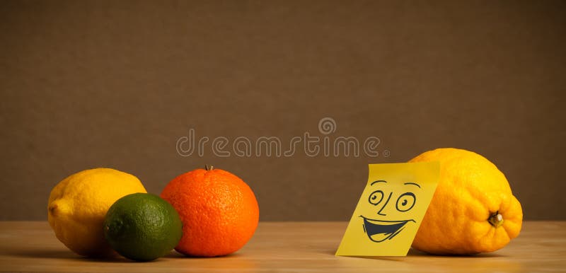 Lemon with Post-it Note Smiling at Citrus Fruits Stock Image - Image of ...
