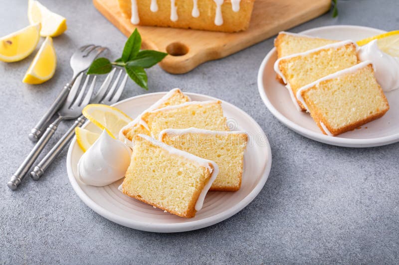 Lemon Pound Cake Slices on a Plate with Whipped Cream Stock Image ...