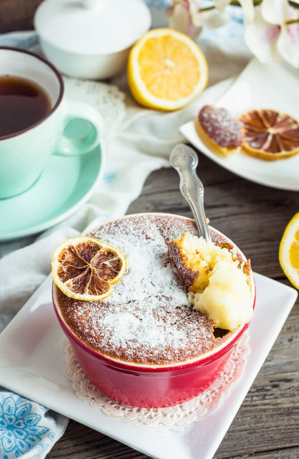 Lemon Pudding with Red Plates on a White Tablecloth Stock Photo - Image ...