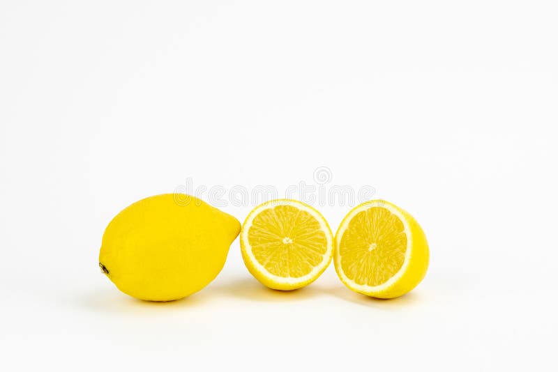 Lemon Pulp Cut in Half and Whole Lemon on White Stock Image - Image of ...