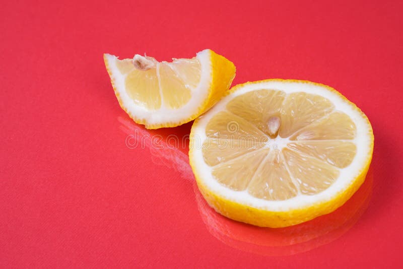 Lemon on red background stock photo. Image of ripe, macro - 108947194