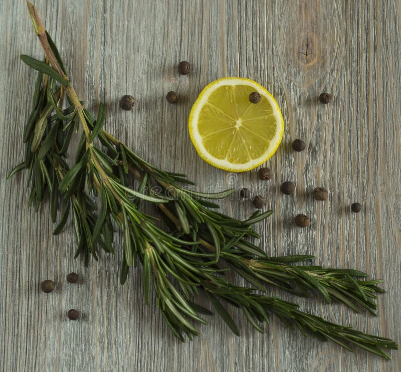 Lemon and rosemary stock image. Image of black, lemon - 50658459