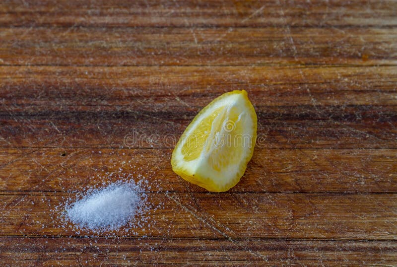Lemon and Salt on a Wood Surface Stock Image - Image of closeup ...
