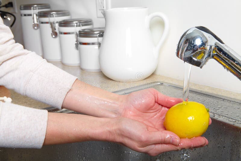 Lemon in the sink stock image. Image of fruit, lifestyles - 71457151