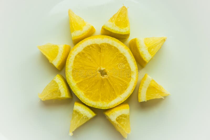 A Lemon Slice in the Shape of the Sun Stock Image - Image of juicy ...