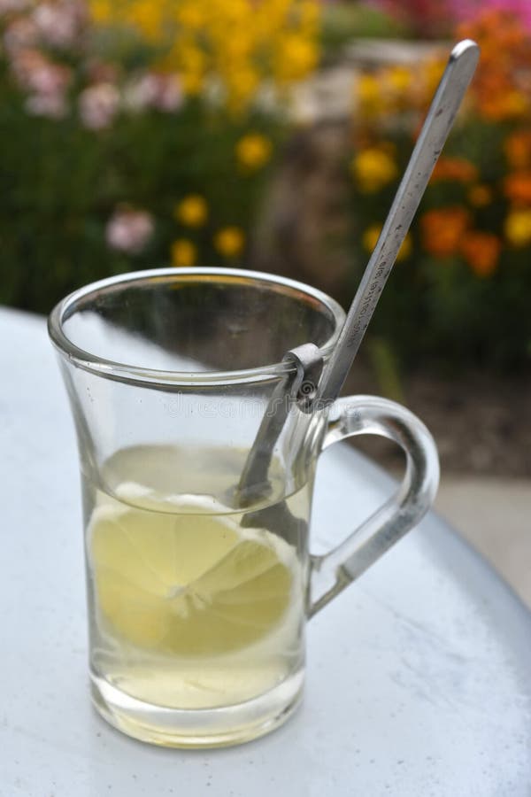 Lemon Slice and Spoon in Glass with Lemonade Stock Photo - Image of ...