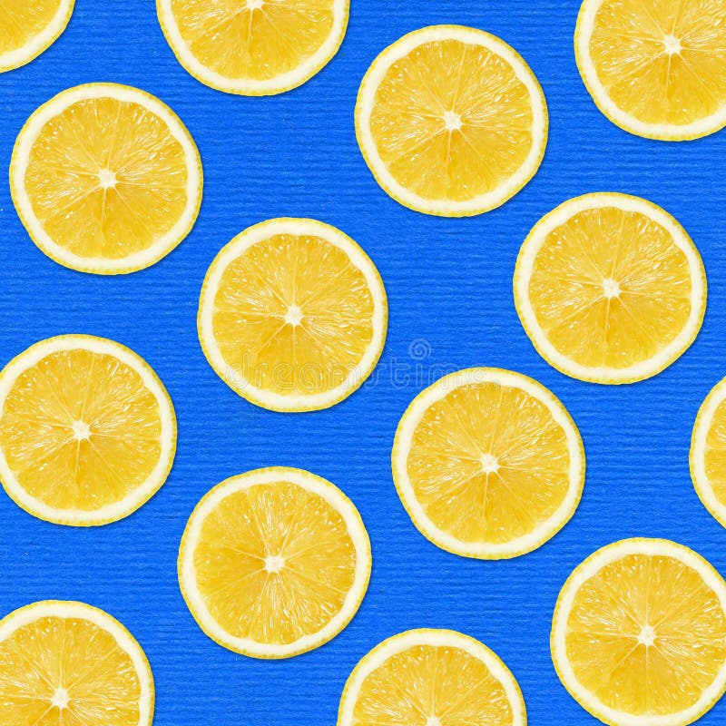 Lemon Slices on Blue Background Stock Photo - Image of ingredient ...