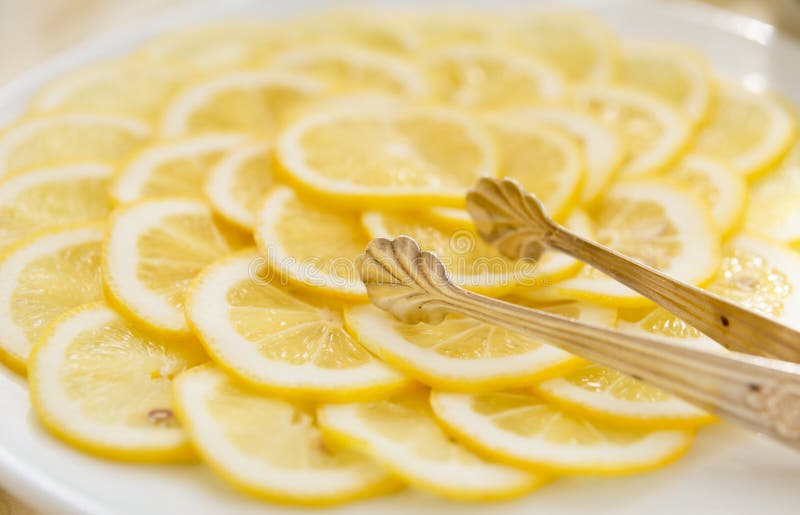 Lemon slices on plate stock image. Image of fruit, pile - 18984489