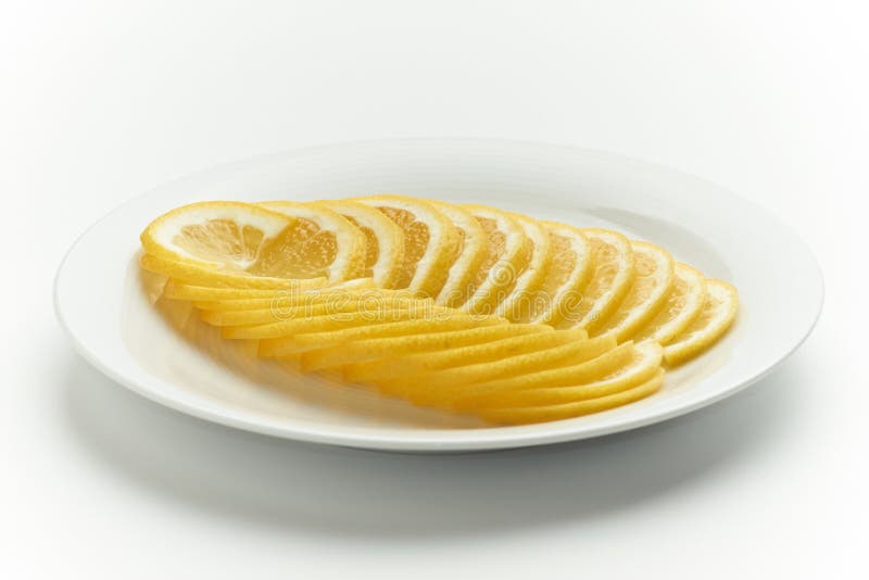 Lemon Slices on Round Plate. White Background Stock Image - Image of ...