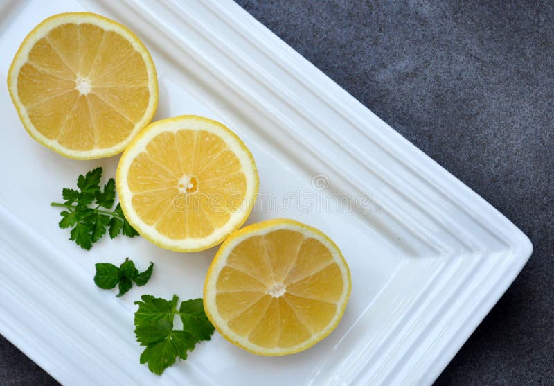 Lemon slices on tray stock image. Image of background - 84546007