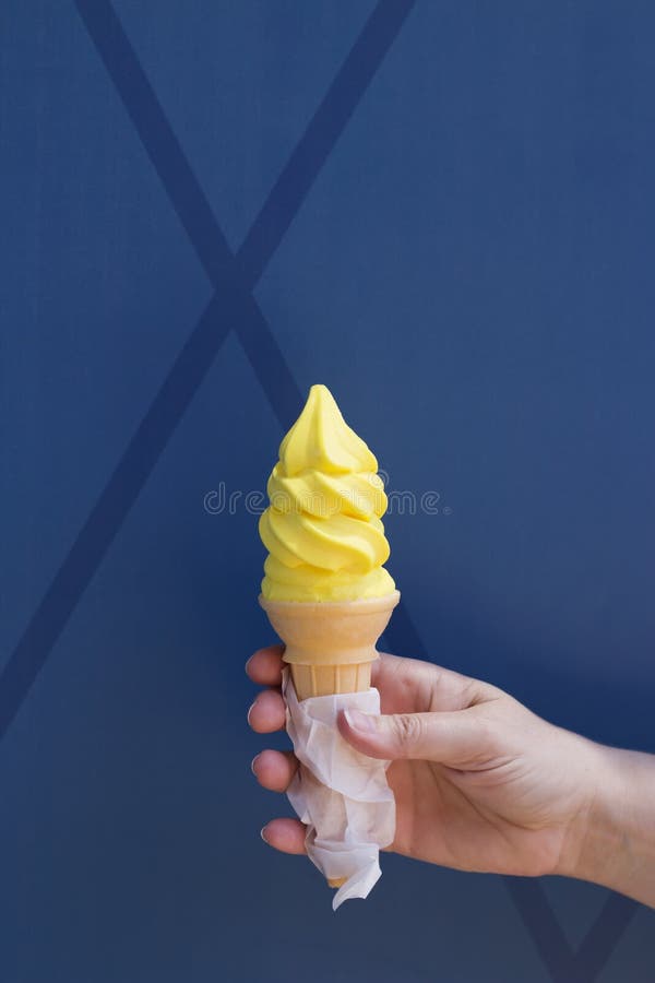 Lemon Soft Serve in a Cone stock image. Image of detail - 155432569