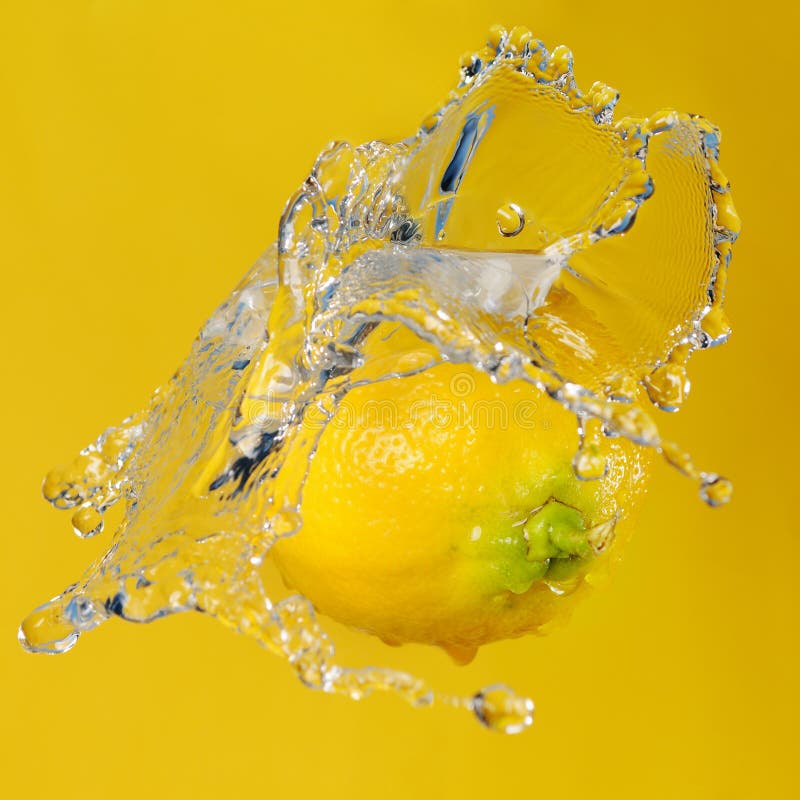 Yellow Lemon in Water Splash Stock Photo - Image of drop, water: 21702910