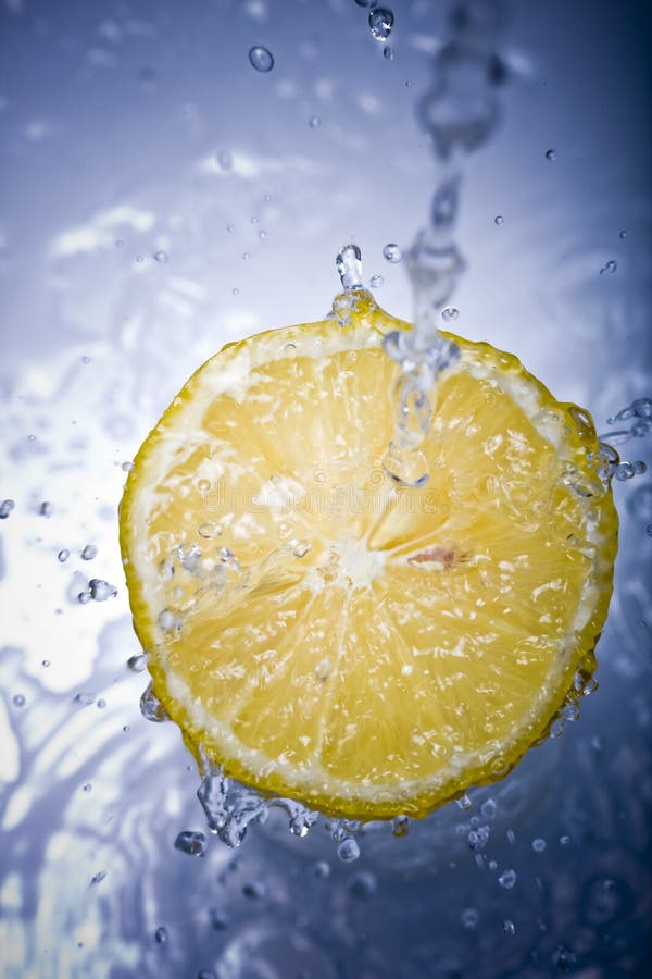 Lemon splash stock photo. Image of vignette, slice, drink - 7413294