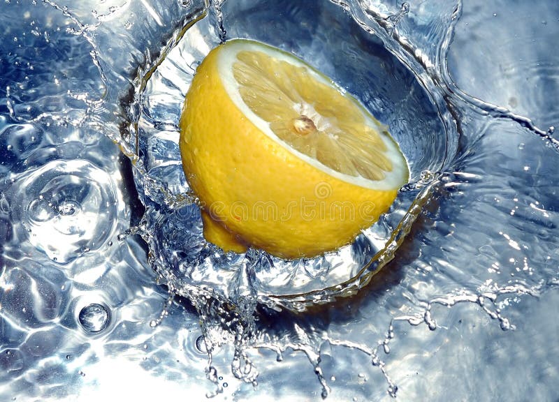 Lemon splashing water stock image. Image of lager, food - 658197