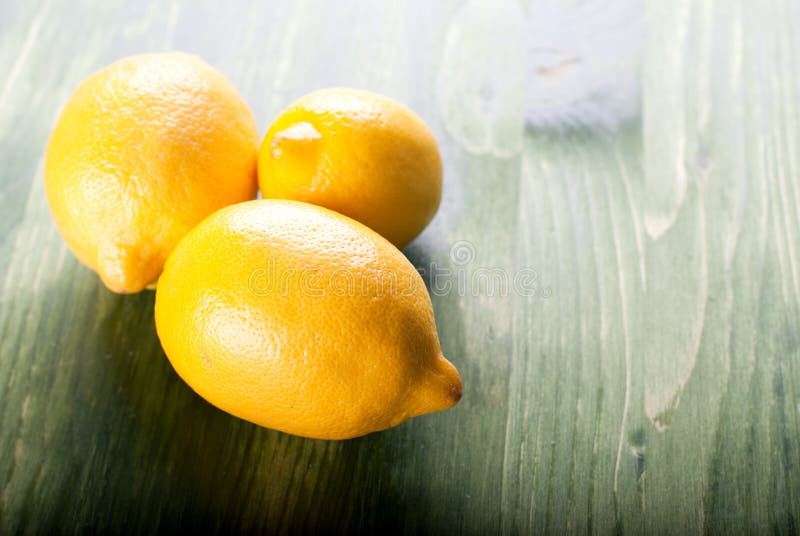 Lemon on a table close-up stock photo. Image of ingredients - 68570370