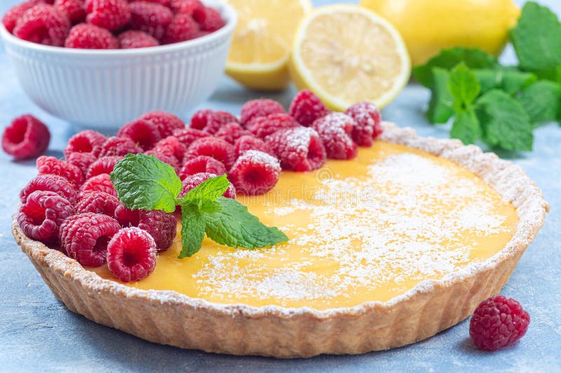 Lemon Tart, Garnished with Fresh Raspberry, Icing Sugar, Mint ...