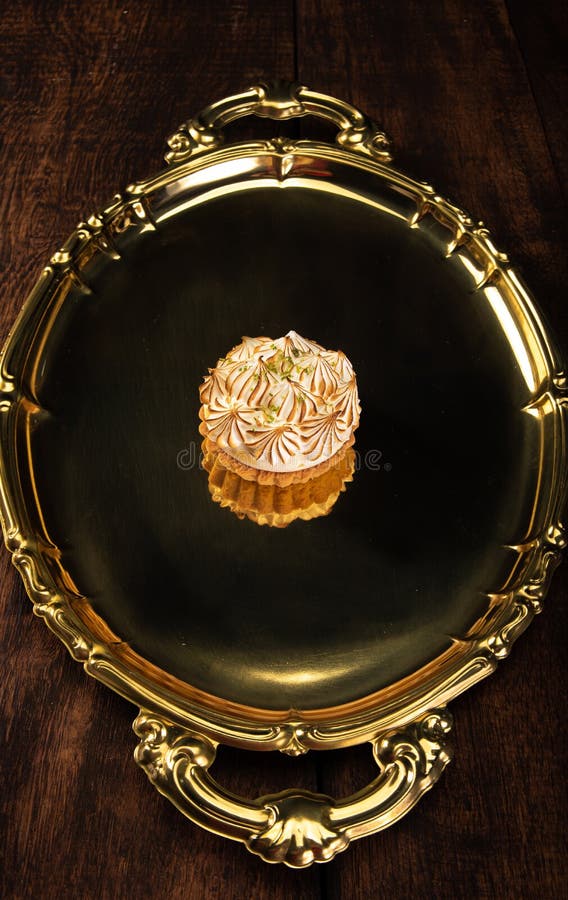 Lemon Tart on a Golden Tray on Rustic Wood, Selective Focus Stock Image ...